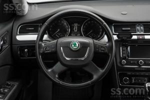 Black Skoda SuperB 2012 in Riga, with an engine capacity of 1.60 L and mileage of 242 thousand km for 5250 €, photo 16 on AUTOMOTO.COM.LV