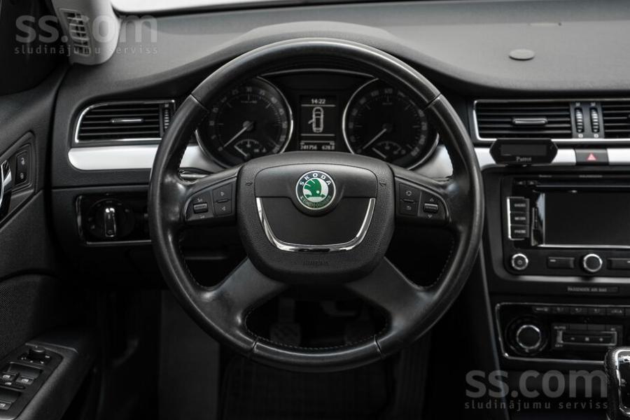 Black Skoda SuperB 2012 in Riga, with an engine capacity of 1.60 L and mileage of 242 thousand km for 5250 €, photo 16 on AUTOMOTO.COM.LV