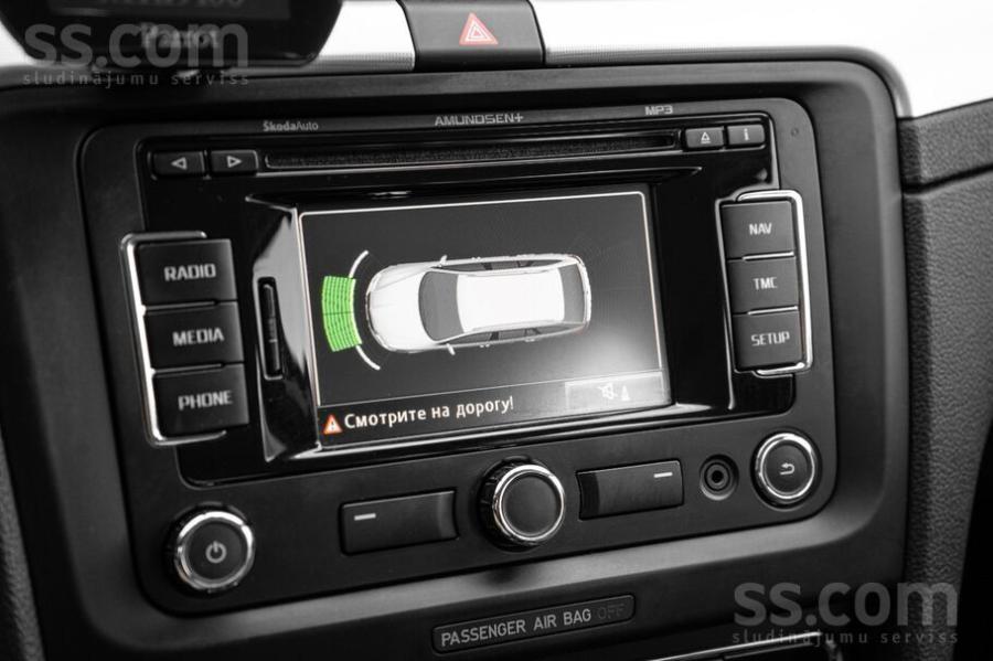 Black Skoda SuperB 2012 in Riga, with an engine capacity of 1.60 L and mileage of 242 thousand km for 5250 €, photo 23 on AUTOMOTO.COM.LV