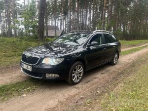 Melns Skoda SuperB 2012 Rīga, ar dzinēja tilpumu 1.80 L un nobraukumu 179 tūkst. km par 6000 €, foto  vietnē AUTOMOTO.COM.LV
