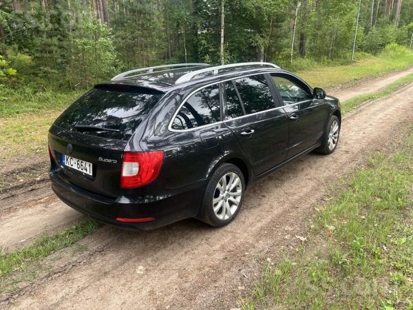 Black Skoda SuperB 2012 in Riga, with an engine capacity of 1.80 L and mileage of 179 thousand km for 6000 €, photo 5 on AUTOMOTO.COM.LV