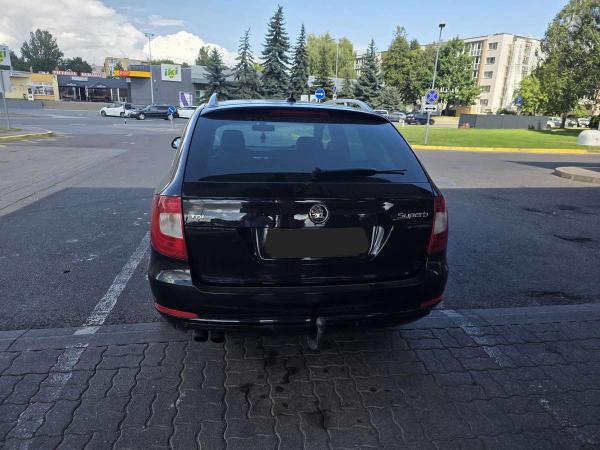 Black Skoda SuperB 2012 in Panevezys, with an engine capacity of 1.97 L and mileage of 341 thousand km for 4599 €, photo 8 on AUTOMOTO.COM.LV