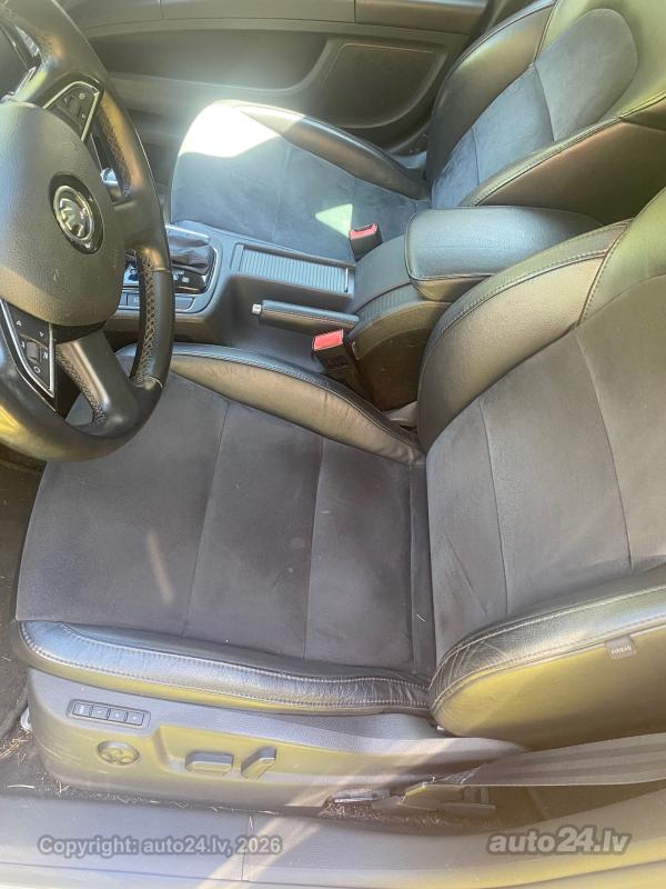 Melns Skoda SuperB 2013 Tallina, ar dzinēja tilpumu 2.00 L un nobraukumu 340 tūkst. km par 6500 €, foto 5 vietnē AUTOMOTO.COM.LV