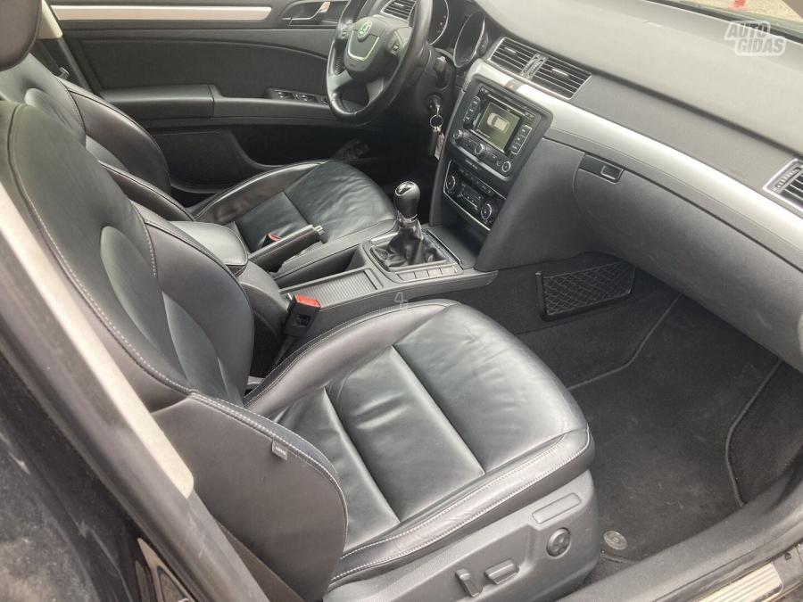 Black Skoda SuperB 2013 in Vilnius, with an engine capacity of 1.60 L and mileage of 335 thousand km for 5199 €, photo 4 on AUTOMOTO.COM.LV