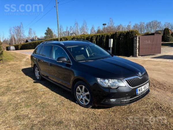 Black Skoda SuperB 2013 in Bauska, with an engine capacity of 2.00 L and mileage of 370 thousand km for 5200 €, photo 2 on AUTOMOTO.COM.LV