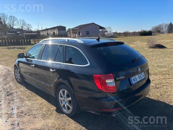 Black Skoda SuperB 2013 in Bauska, with an engine capacity of 2.00 L and mileage of 370 thousand km for 5200 €, photo 3 on AUTOMOTO.COM.LV