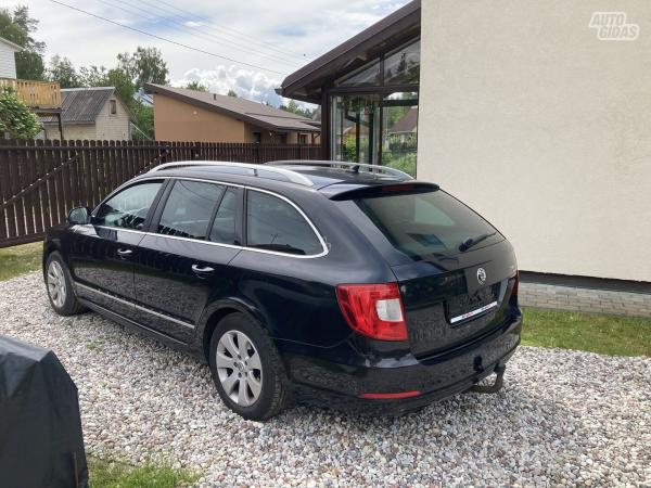 Black Skoda SuperB 2013 in Vilnius, with an engine capacity of 1.60 L and mileage of 335 thousand km for 4999 €, photo 4 on AUTOMOTO.COM.LV
