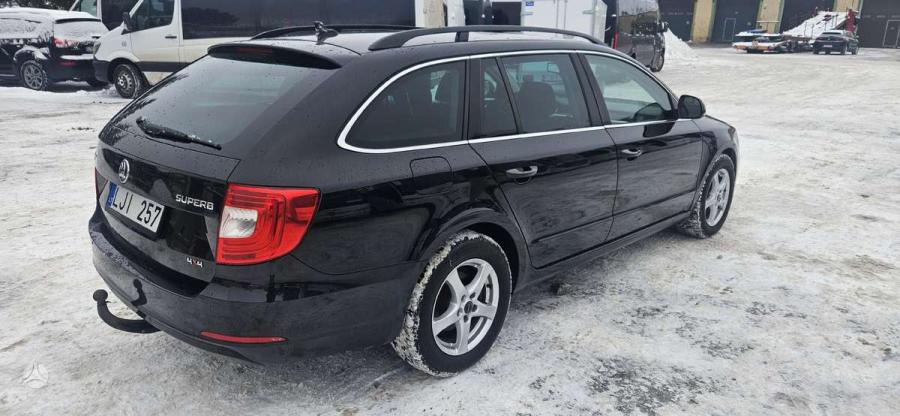 Black Skoda SuperB 2014 in Vilnius, with an engine capacity of 1.97 L and mileage of 330 thousand km for 7296 €, photo 3 on AUTOMOTO.COM.LV