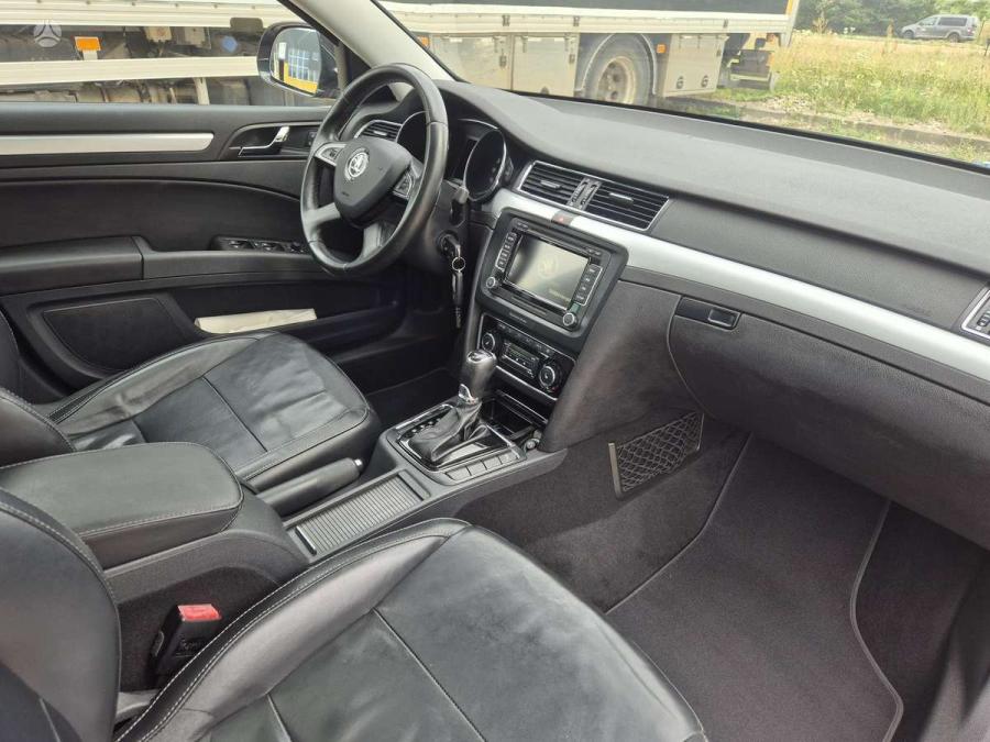 Black Skoda SuperB 2014 in Utena, with an engine capacity of 1.97 L and mileage of 215 thousand km for 7300 €, photo 9 on AUTOMOTO.COM.LV