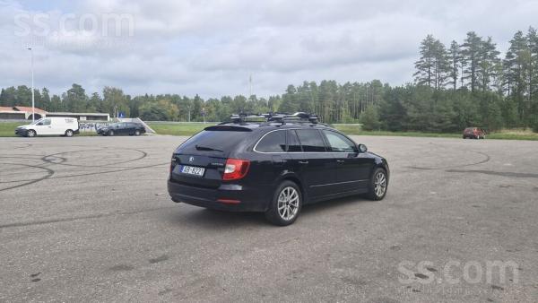 Black Skoda SuperB 2014 in Riga, with an engine capacity of 2.00 L and mileage of 251 thousand km for 7500 €, photo 5 on AUTOMOTO.COM.LV