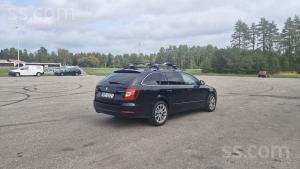 Black Skoda SuperB 2014 in Riga, with an engine capacity of 2.00 L and mileage of 251 thousand km for 7500 €, photo 5 on AUTOMOTO.COM.LV