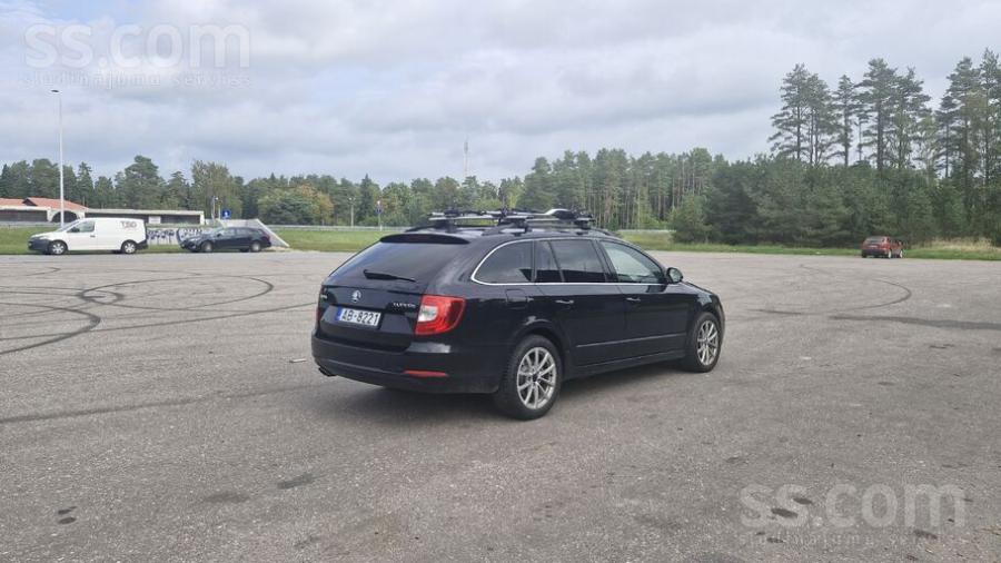 Black Skoda SuperB 2014 in Riga, with an engine capacity of 2.00 L and mileage of 251 thousand km for 7500 €, photo 5 on AUTOMOTO.COM.LV