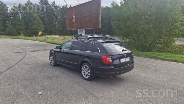 Black Skoda SuperB 2014 in Riga, with an engine capacity of 2.00 L and mileage of 251 thousand km for 7500 €, photo 6 on AUTOMOTO.COM.LV
