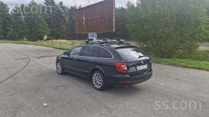 Black Skoda SuperB 2014 in Riga, with an engine capacity of 2.00 L and mileage of 251 thousand km for 7500 €, photo 6 on AUTOMOTO.COM.LV