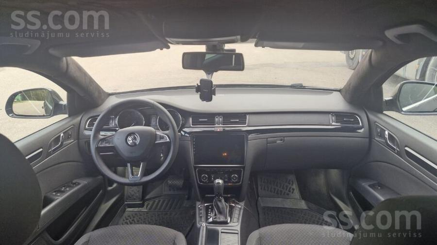 Black Skoda SuperB 2014 in Riga, with an engine capacity of 2.00 L and mileage of 251 thousand km for 7500 €, photo 8 on AUTOMOTO.COM.LV