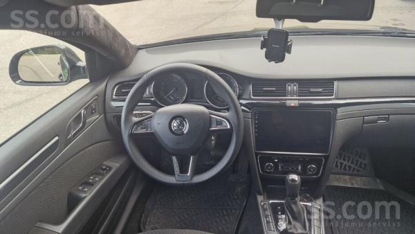 Black Skoda SuperB 2014 in Riga, with an engine capacity of 2.00 L and mileage of 251 thousand km for 7500 €, photo 9 on AUTOMOTO.COM.LV