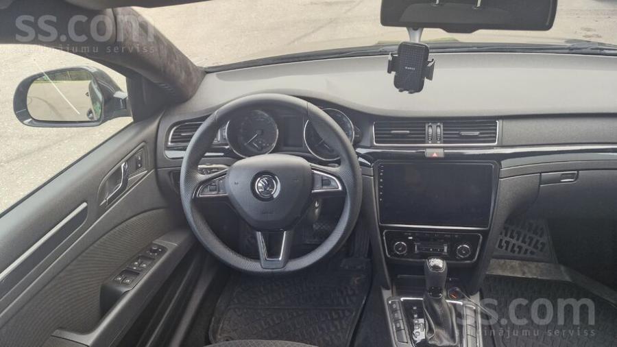 Black Skoda SuperB 2014 in Riga, with an engine capacity of 2.00 L and mileage of 251 thousand km for 7500 €, photo 9 on AUTOMOTO.COM.LV