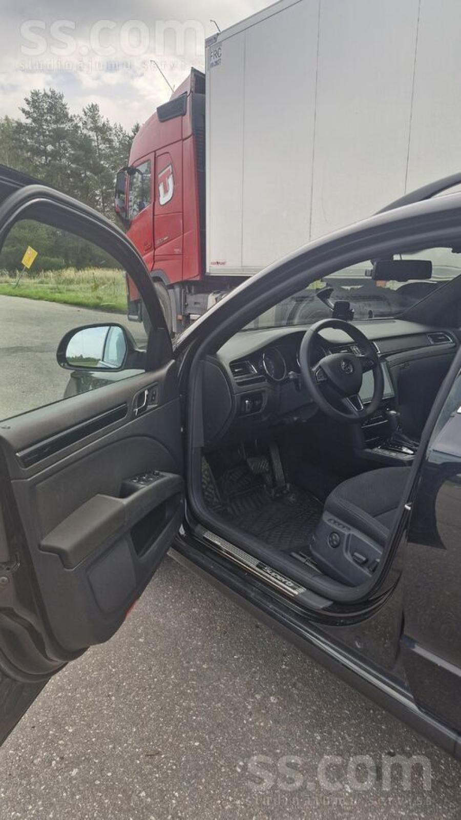Black Skoda SuperB 2014 in Riga, with an engine capacity of 2.00 L and mileage of 251 thousand km for 7500 €, photo 10 on AUTOMOTO.COM.LV