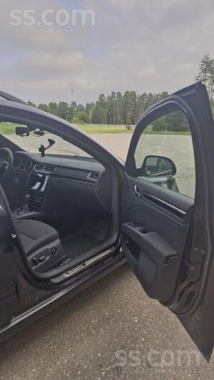 Black Skoda SuperB 2014 in Riga, with an engine capacity of 2.00 L and mileage of 251 thousand km for 7500 €, photo 12 on AUTOMOTO.COM.LV