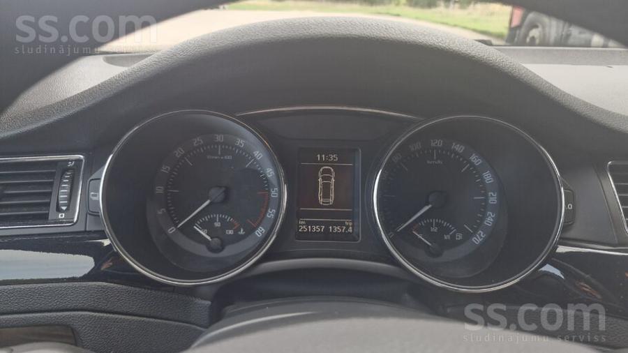 Black Skoda SuperB 2014 in Riga, with an engine capacity of 2.00 L and mileage of 251 thousand km for 7500 €, photo 19 on AUTOMOTO.COM.LV