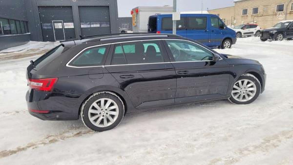 Black Skoda SuperB 2016 in Siauliai, with an engine capacity of 1.60 L and mileage of 244 thousand km for 9950 €, photo 7 on AUTOMOTO.COM.LV