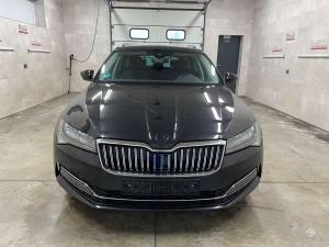 Black Skoda SuperB 2023 in Marijampole, with an engine capacity of 1.50 L and mileage of 186 thousand km for 17545 €, photo 3 on AUTOMOTO.COM.LV