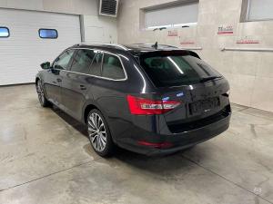 Black Skoda SuperB 2023 in Marijampole, with an engine capacity of 1.50 L and mileage of 186 thousand km for 17545 €, photo 5 on AUTOMOTO.COM.LV