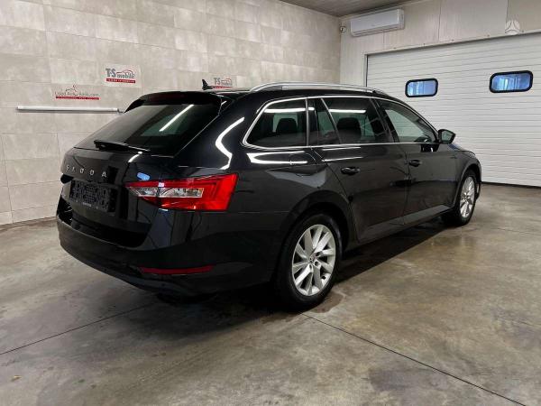 Black Skoda SuperB 2023 in Marijampole, with an engine capacity of 1.50 L and mileage of 195 thousand km for 16698 €, photo 4 on AUTOMOTO.COM.LV