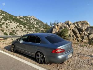 Blue Skoda SuperB 2009 in Vilnius, with an engine capacity of 1.97 L and mileage of 377 thousand km for 3490 €, photo 19 on AUTOMOTO.COM.LV