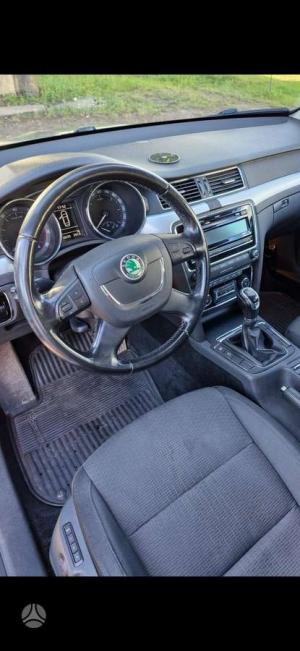 Brown Skoda SuperB 2009 in Vilnius, with an engine capacity of 1.80 L and mileage of 280 thousand km for 2650 €, photo 13 on AUTOMOTO.COM.LV