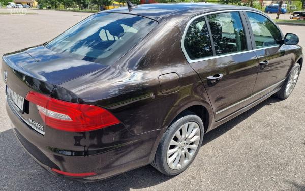 Brown Skoda SuperB 2013 in Utena, with an engine capacity of 2.00 L and mileage of 158 thousand km for 7999 €, photo 4 on AUTOMOTO.COM.LV