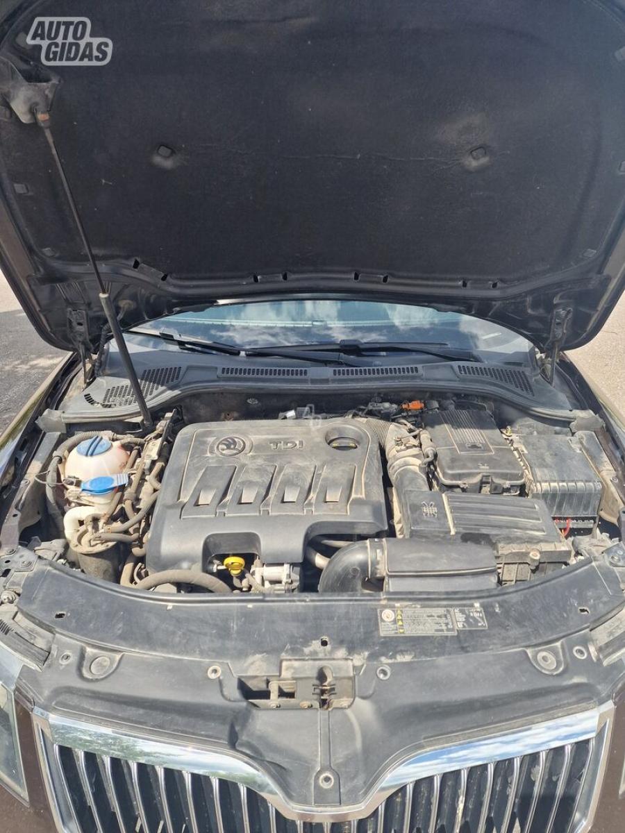 Brown Skoda SuperB 2013 in Utena, with an engine capacity of 2.00 L and mileage of 158 thousand km for 7999 €, photo 16 on AUTOMOTO.COM.LV