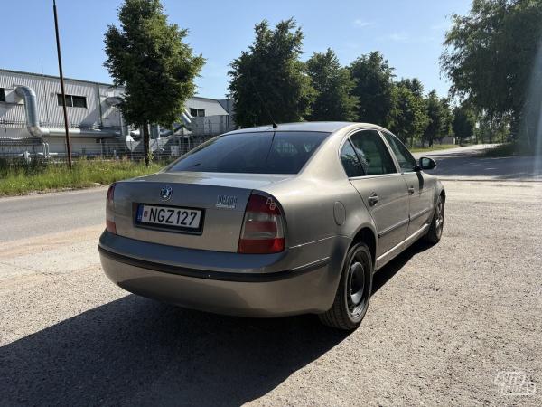 Brown Skoda SuperB 2008 in Klaipeda, with an engine capacity of 1.90 L and mileage of 230 thousand km for 1250 €, photo 5 on AUTOMOTO.COM.LV