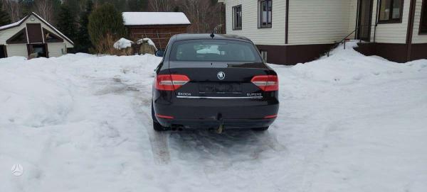 Brown Skoda SuperB 2013 in Trakai, with an engine capacity of 2.00 L and mileage of 200 thousand km for 4850 €, photo 5 on AUTOMOTO.COM.LV