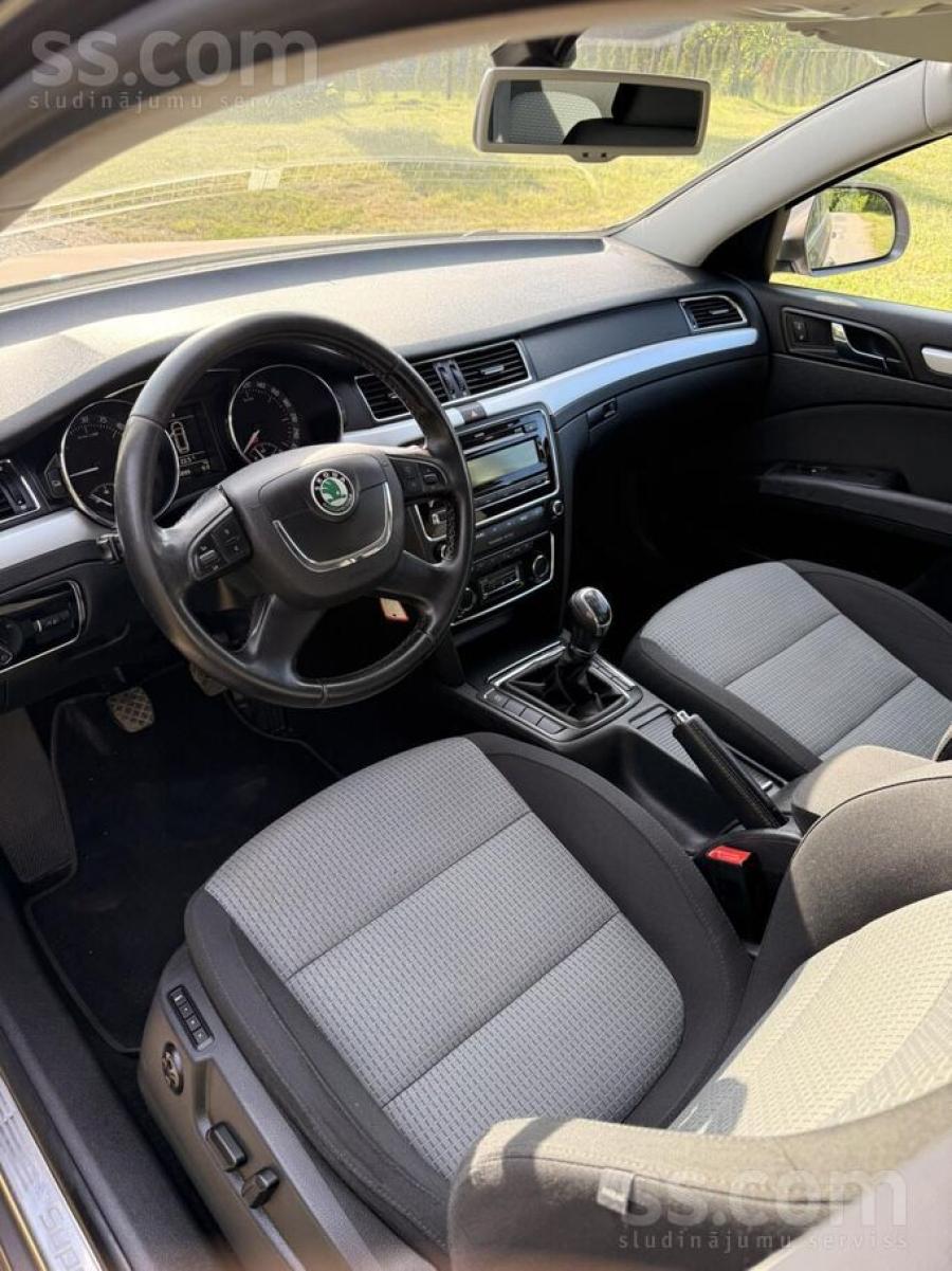 Brown Skoda SuperB 2010 in Ludza, with an engine capacity of 1.90 L and mileage of 264 thousand km for 5290 €, photo 12 on AUTOMOTO.COM.LV