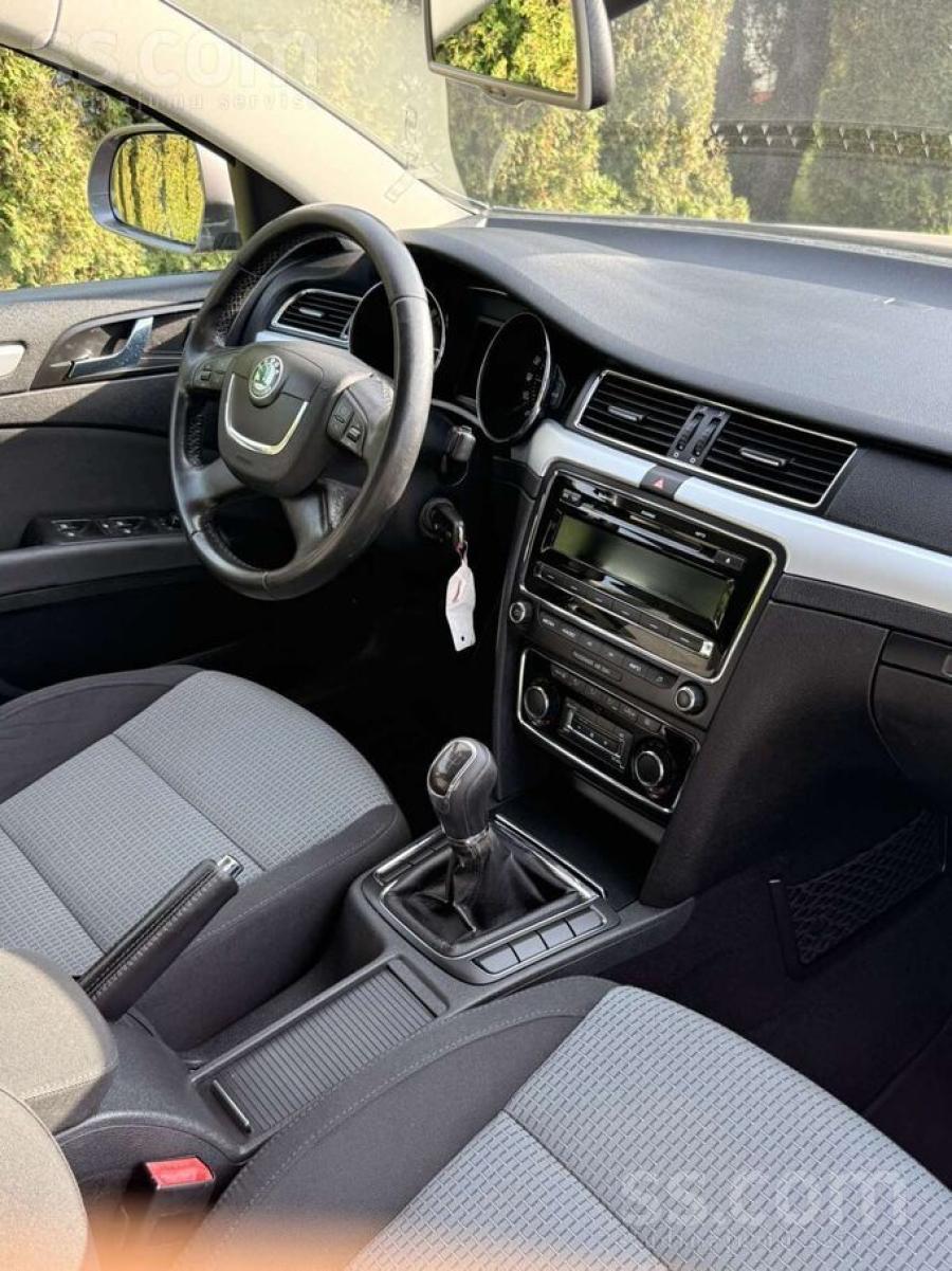 Brown Skoda SuperB 2010 in Ludza, with an engine capacity of 1.90 L and mileage of 264 thousand km for 5290 €, photo 14 on AUTOMOTO.COM.LV