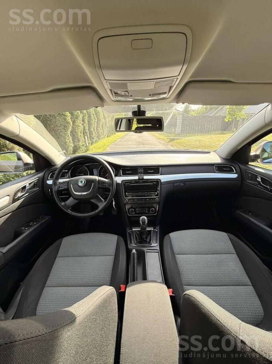 Brown Skoda SuperB 2010 in Ludza, with an engine capacity of 1.90 L and mileage of 264 thousand km for 5290 €, photo 15 on AUTOMOTO.COM.LV