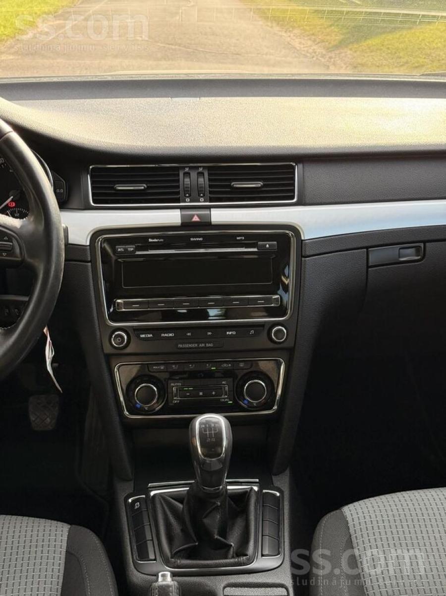 Brown Skoda SuperB 2010 in Ludza, with an engine capacity of 1.90 L and mileage of 264 thousand km for 5290 €, photo 17 on AUTOMOTO.COM.LV