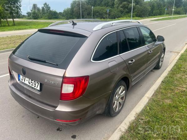 Brown Skoda SuperB 2010 in Riga, with an engine capacity of 2.00 L and mileage of 319 thousand km for 2000 €, photo 8 on AUTOMOTO.COM.LV