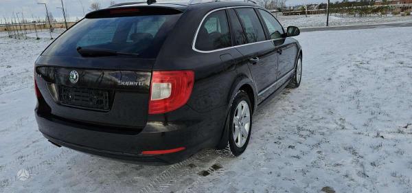 Brown Skoda SuperB 2012 in Ukmerge, with an engine capacity of 2.00 L and mileage of 249 thousand km for 7200 €, photo 6 on AUTOMOTO.COM.LV