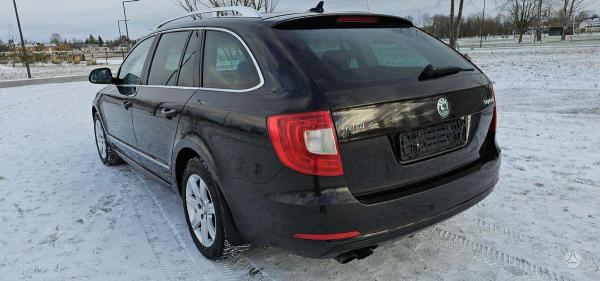 Brown Skoda SuperB 2012 in Ukmerge, with an engine capacity of 2.00 L and mileage of 249 thousand km for 7200 €, photo 7 on AUTOMOTO.COM.LV