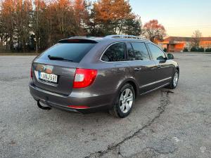 Brown Skoda SuperB 2012 in Taurage, with an engine capacity of 1.97 L and mileage of 283 thousand km for 6200 €, photo 8 on AUTOMOTO.COM.LV
