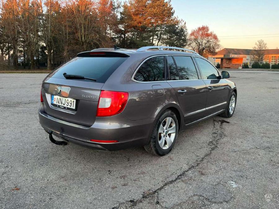 Brown Skoda SuperB 2012 in Taurage, with an engine capacity of 1.97 L and mileage of 283 thousand km for 6200 €, photo 8 on AUTOMOTO.COM.LV