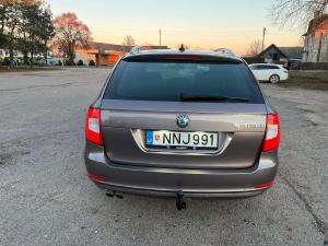 Brown Skoda SuperB 2012 in Taurage, with an engine capacity of 1.97 L and mileage of 283 thousand km for 6200 €, photo 9 on AUTOMOTO.COM.LV