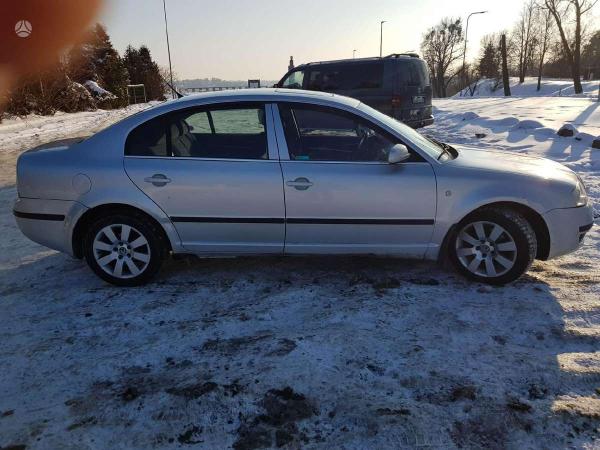 Grey Skoda SuperB 2005 in Kaunas, with an engine capacity of 1.90 L and mileage of 279 thousand km for 1350 €, photo 4 on AUTOMOTO.COM.LV