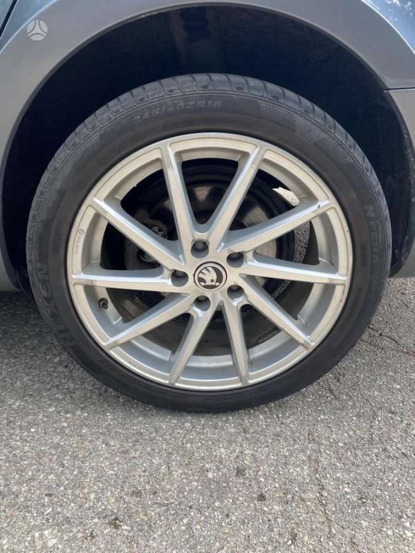 Grey Skoda SuperB 2014 in Panevezys, with an engine capacity of 1.97 L and mileage of 223 thousand km for 9200 €, photo 9 on AUTOMOTO.COM.LV