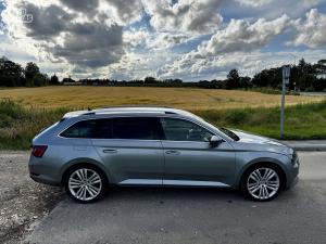 Grey Skoda SuperB 2015 in Marijampole, with an engine capacity of 1.60 L and mileage of 234 thousand km for 10500 €, photo 4 on AUTOMOTO.COM.LV