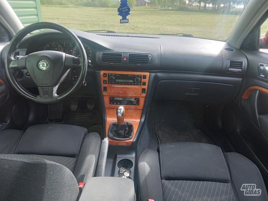 Red Skoda SuperB 2007 in Siauliai, with an engine capacity of 2.00 L and mileage of 290 thousand km for 2250 €, photo 12 on AUTOMOTO.COM.LV