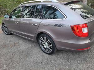 Violet Skoda SuperB 2010 in Vilnius, with an engine capacity of 1.97 L and mileage of 244 thousand km for 3100 €, photo 5 on AUTOMOTO.COM.LV