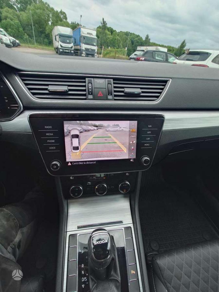 White Skoda SuperB 2023 in Taurage, with an engine capacity of 1.97 L and mileage of 251 thousand km for 14100 €, photo 16 on AUTOMOTO.COM.LV